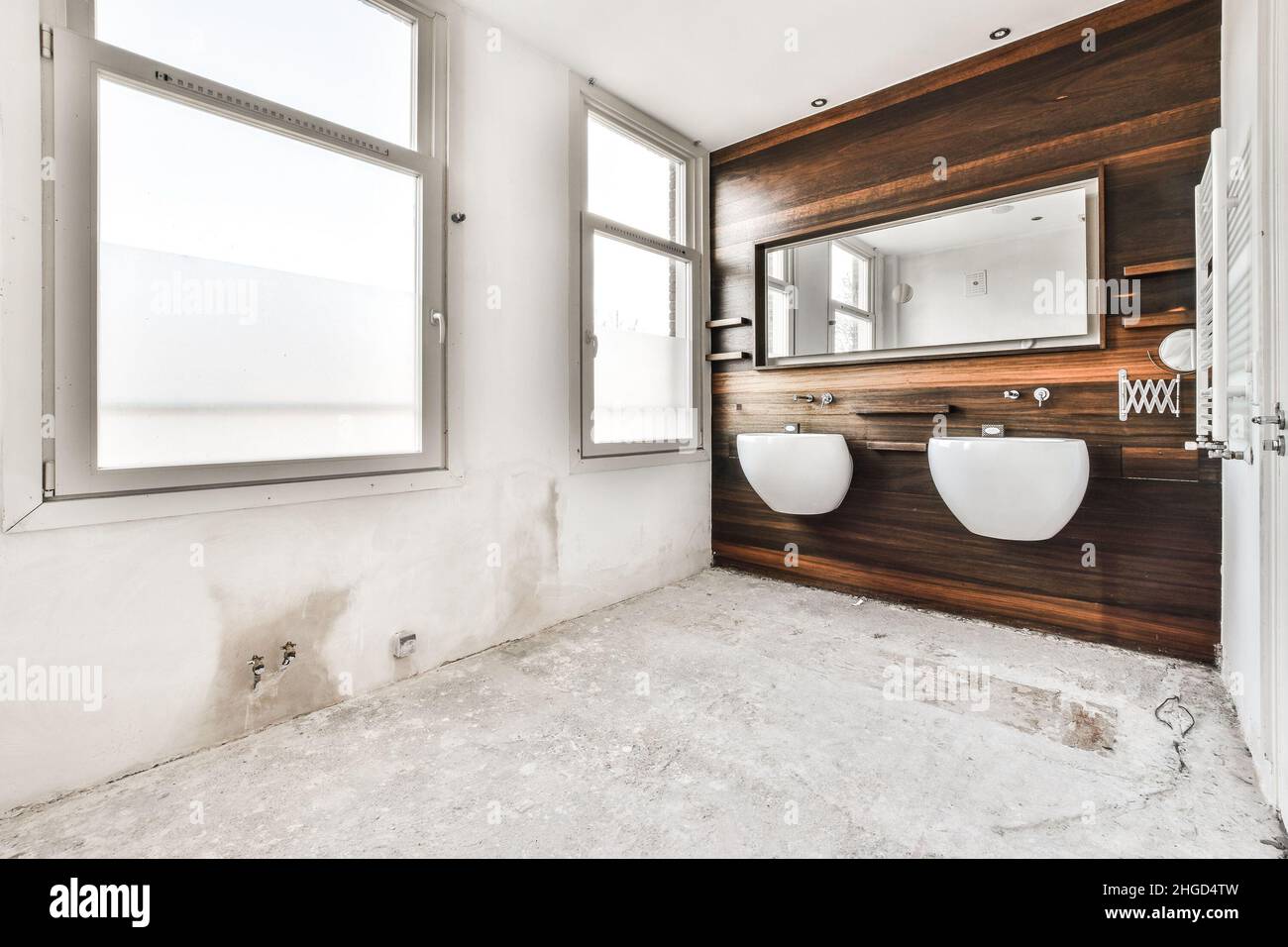 Stylish bathroom with two windows and two sinks and a large window ...