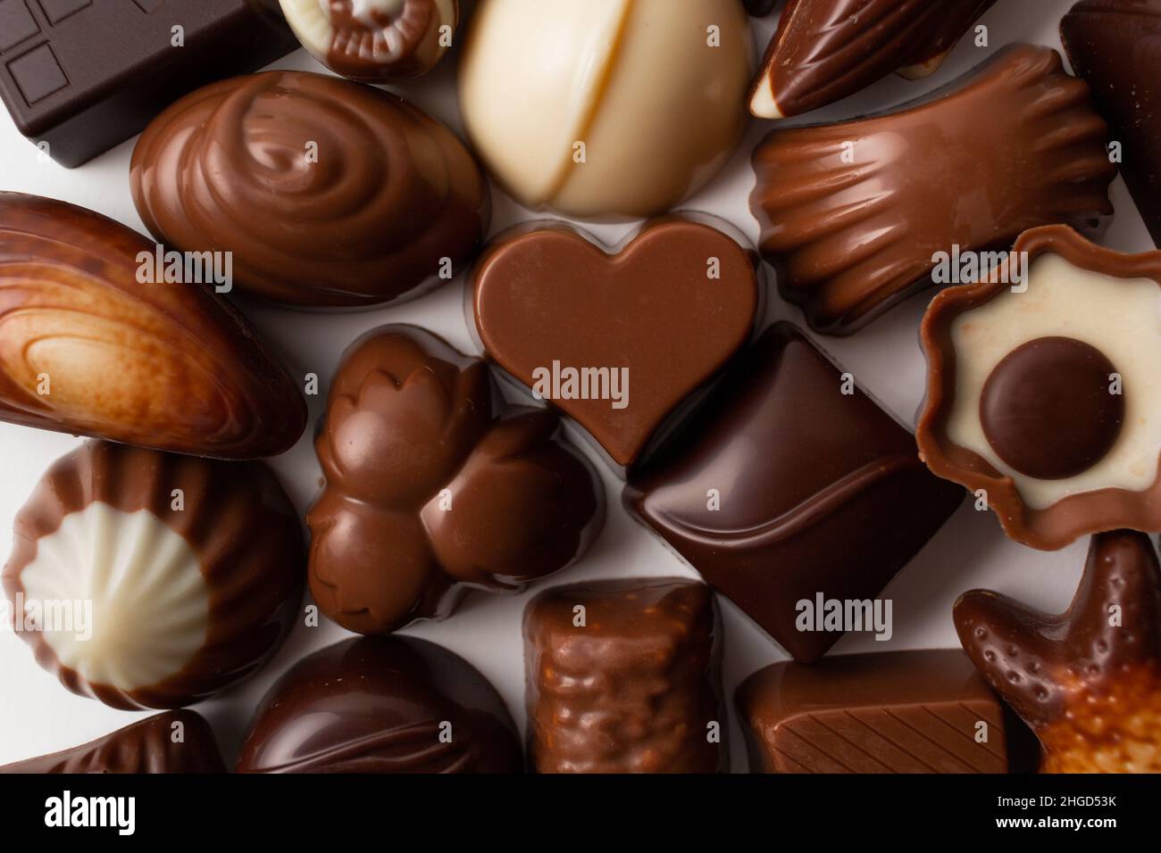 Variety of chocolates isolated on white background Stock Photo - Alamy