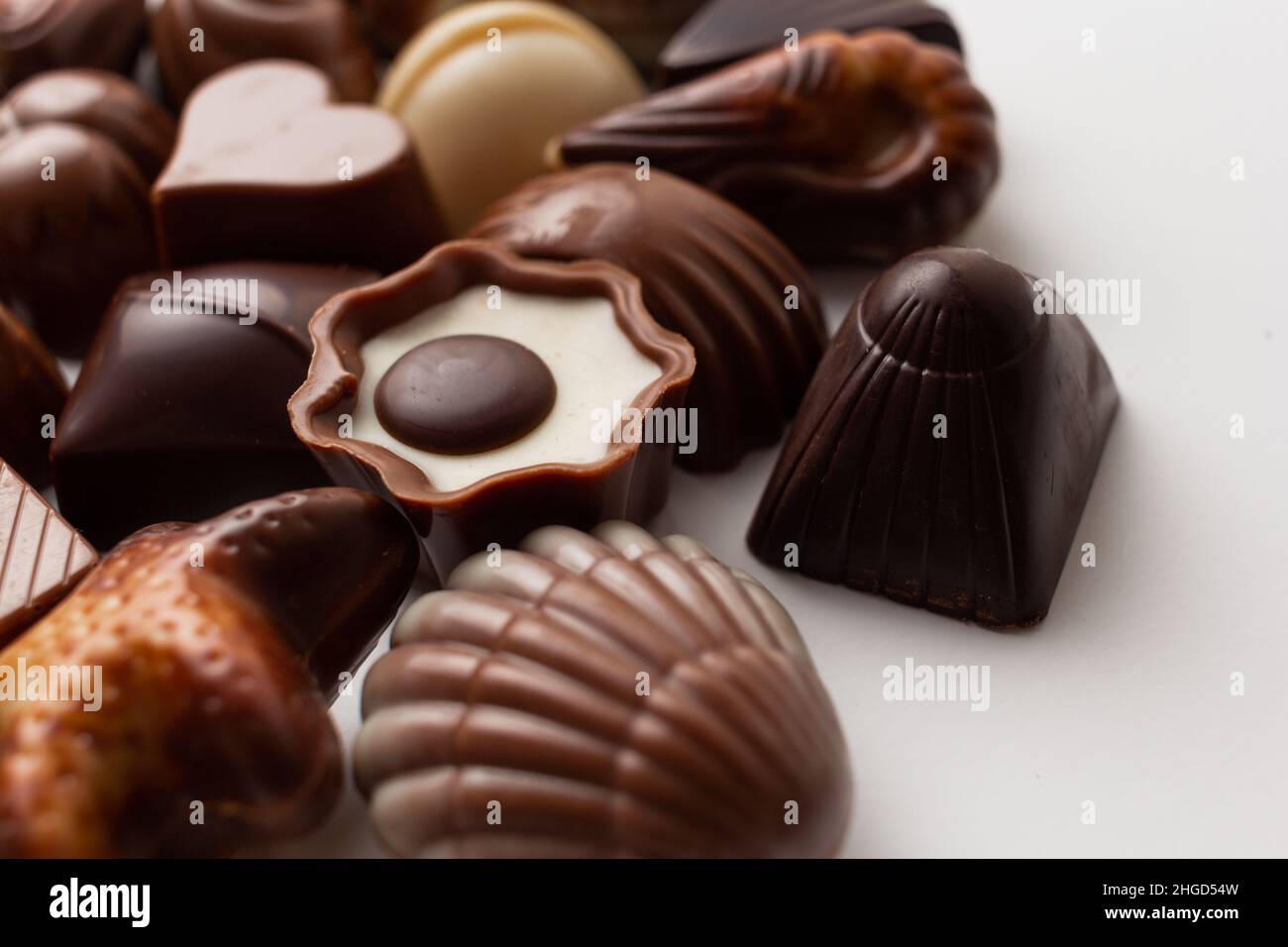 Variety of chocolates isolated on white background Stock Photo - Alamy