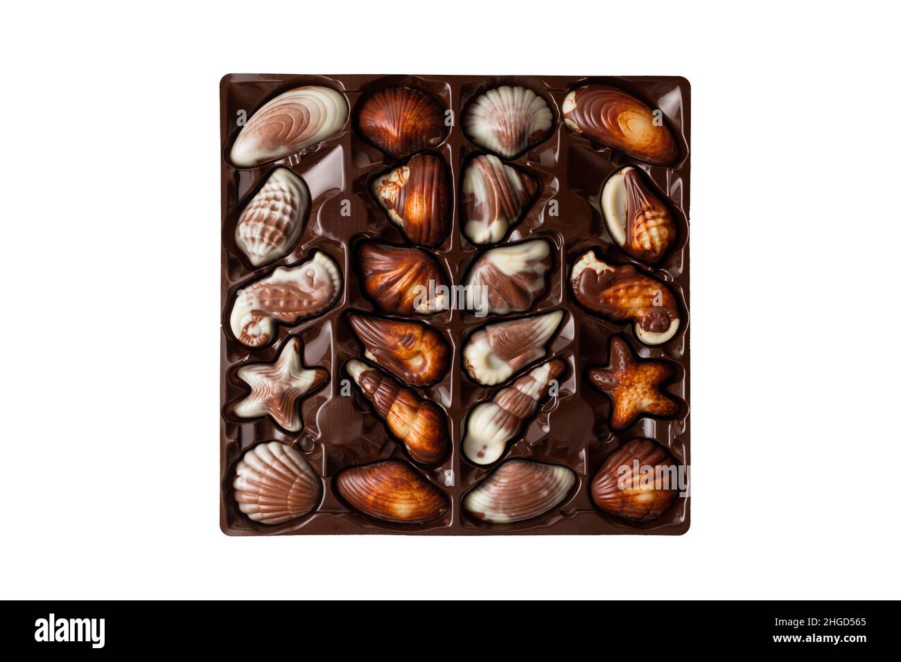 Box of chocolates seashells isolated on white background Stock Photo ...