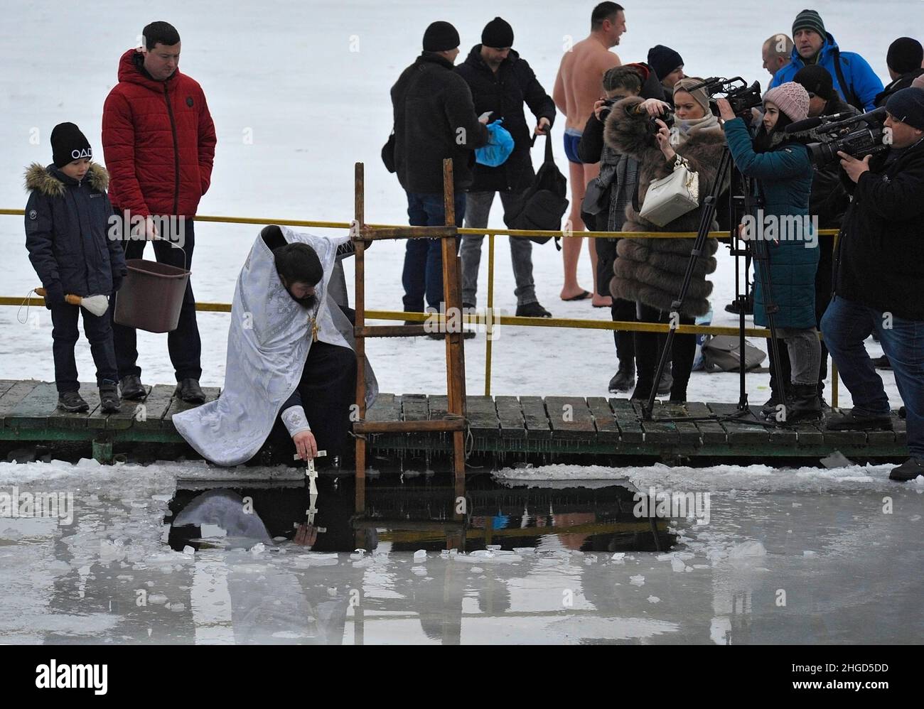 VINNYTSIA, UKRAINE - JANUARY 19, 2022 - Journalists cover the consecration of Lake Vyshenske by ...