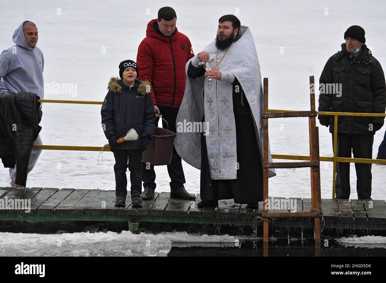 VINNYTSIA, UKRAINE - JANUARY 19, 2022 - A priest performs the ceremony ...