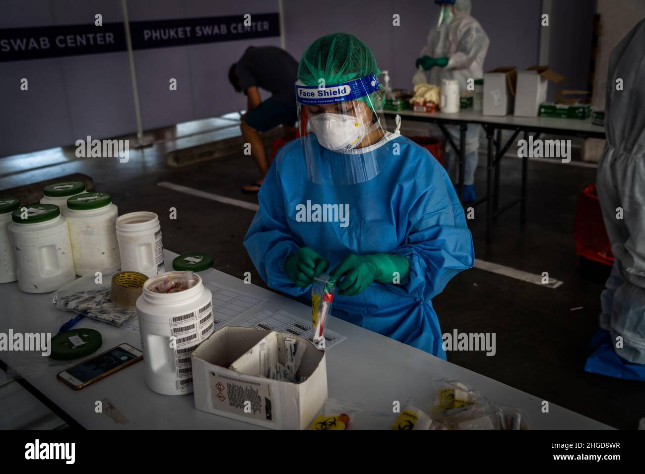 Medical worker packages PCR tests as a part of the Phuket sandbox.The ...