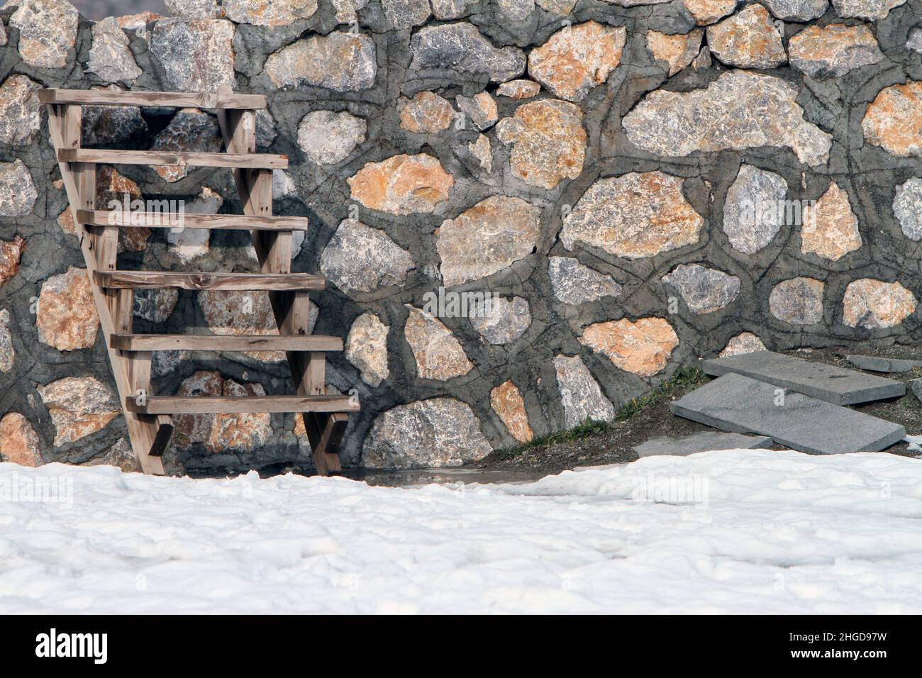 Ladder and stone wall Stock Photo - Alamy