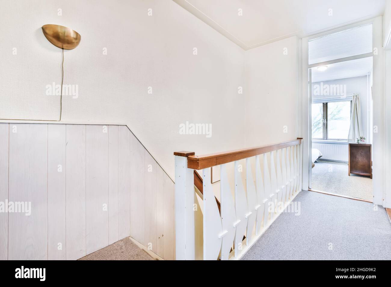 Amazing bright corridor with stairs with comfortable handrails Stock ...