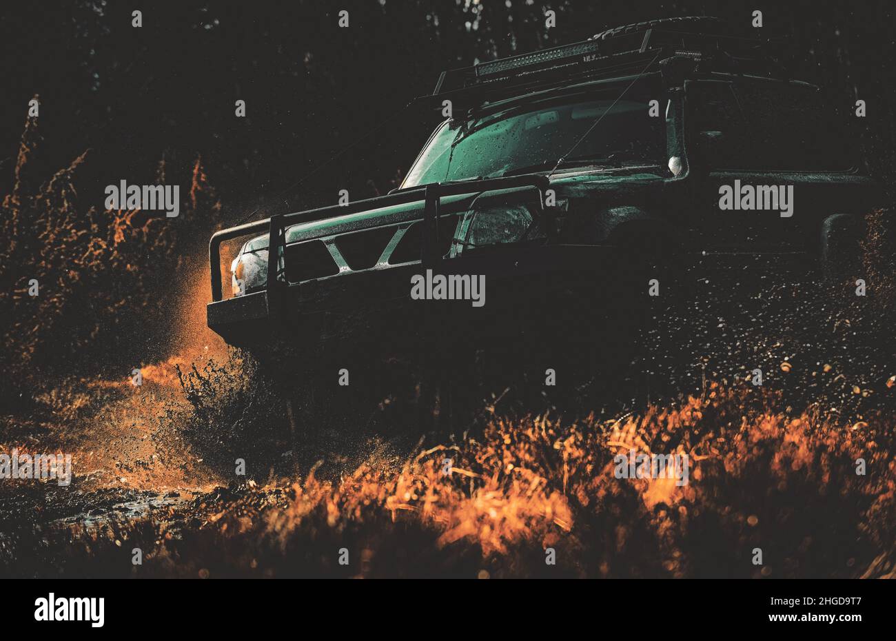 Safari suv. Mud and water splash in off the road racing. Off-road ...