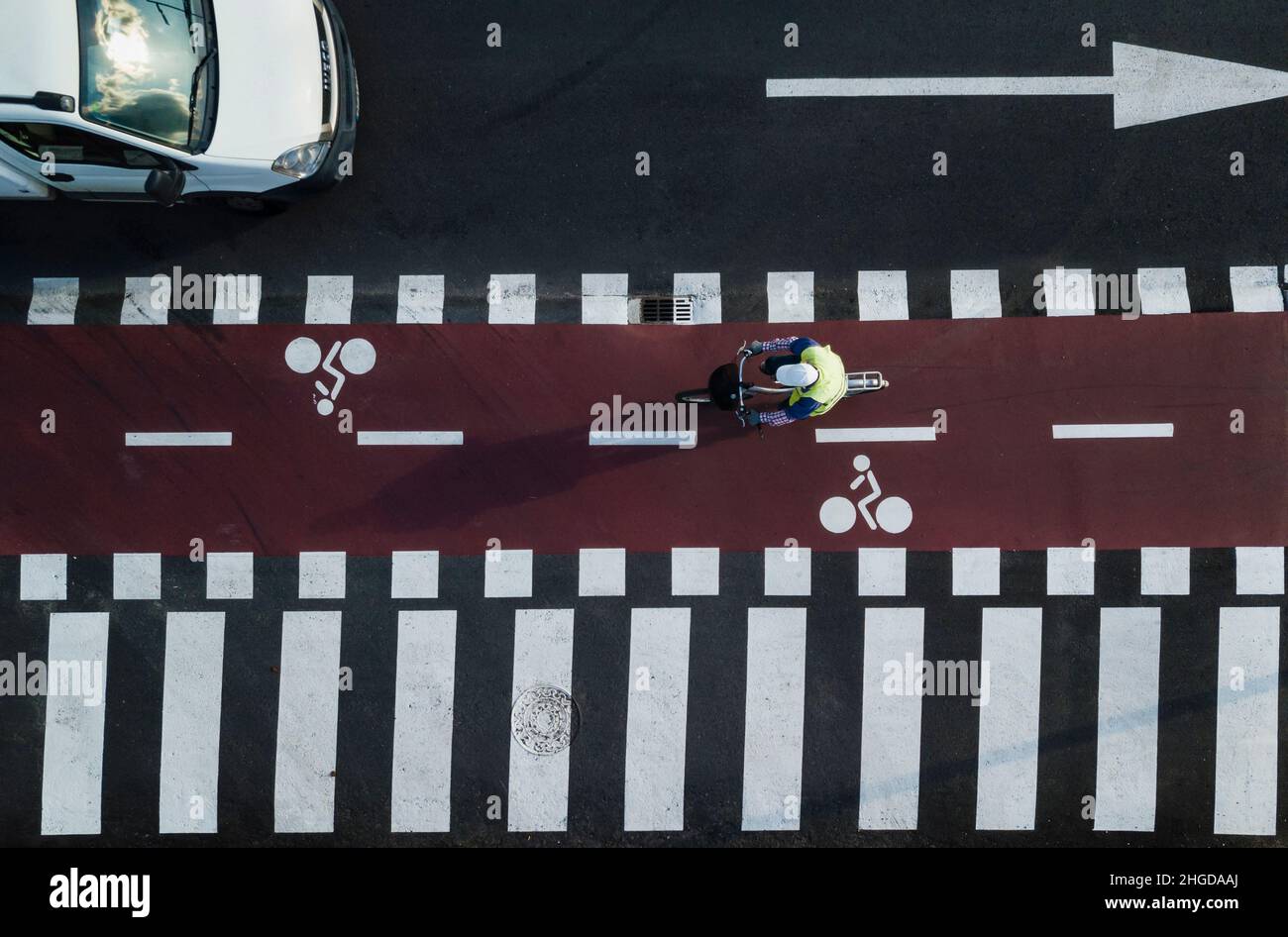 Aerial view of a cyclist riding on a cycle path Stock Photo - Alamy