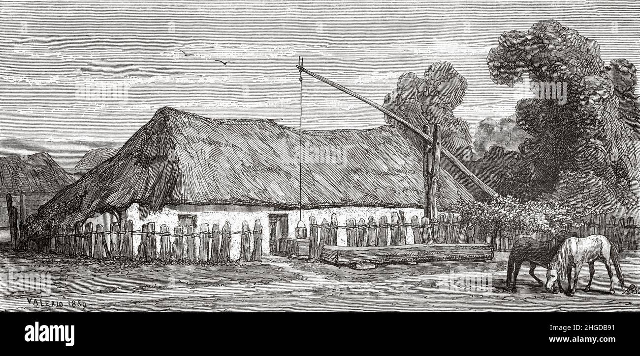 Hut and water well near Essek, Slavonija region of Croatia, Europe. Old ...