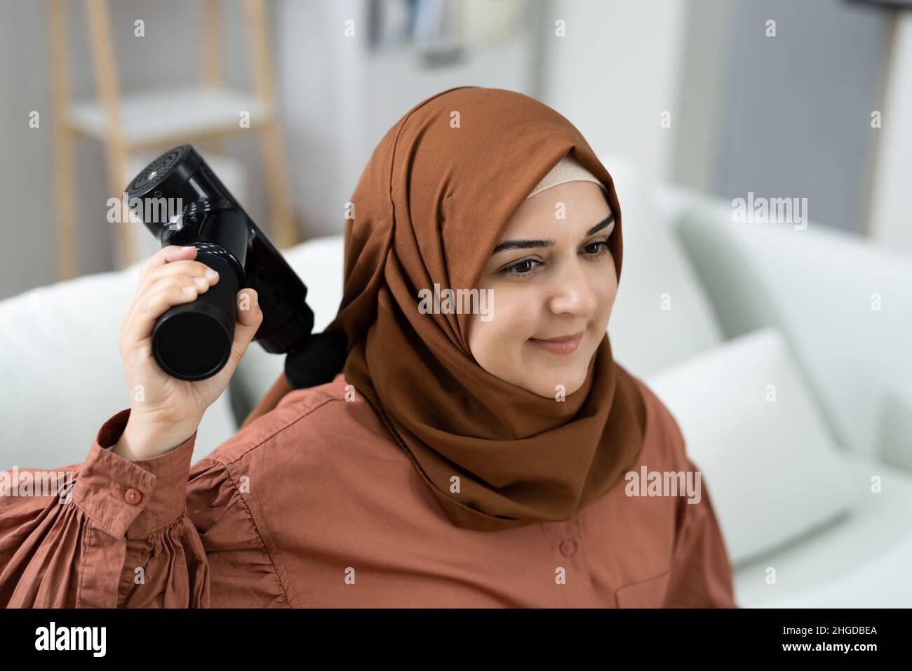 Massage Gun Machine Recovery Therapy And Stimulation Stock Photo - Alamy