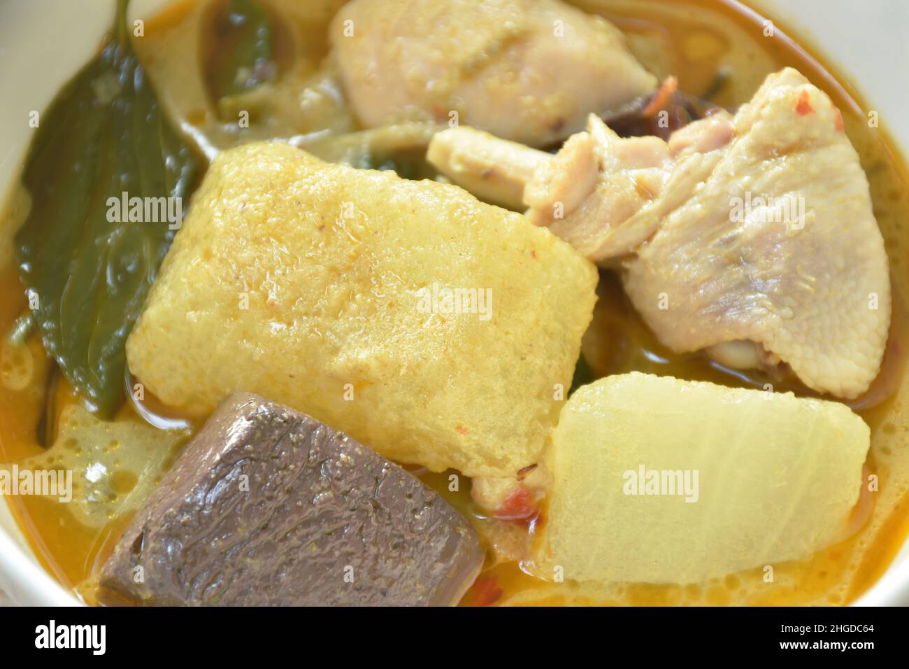 spicy boiled slice winter melon with chicken and blood in coconut milk ...