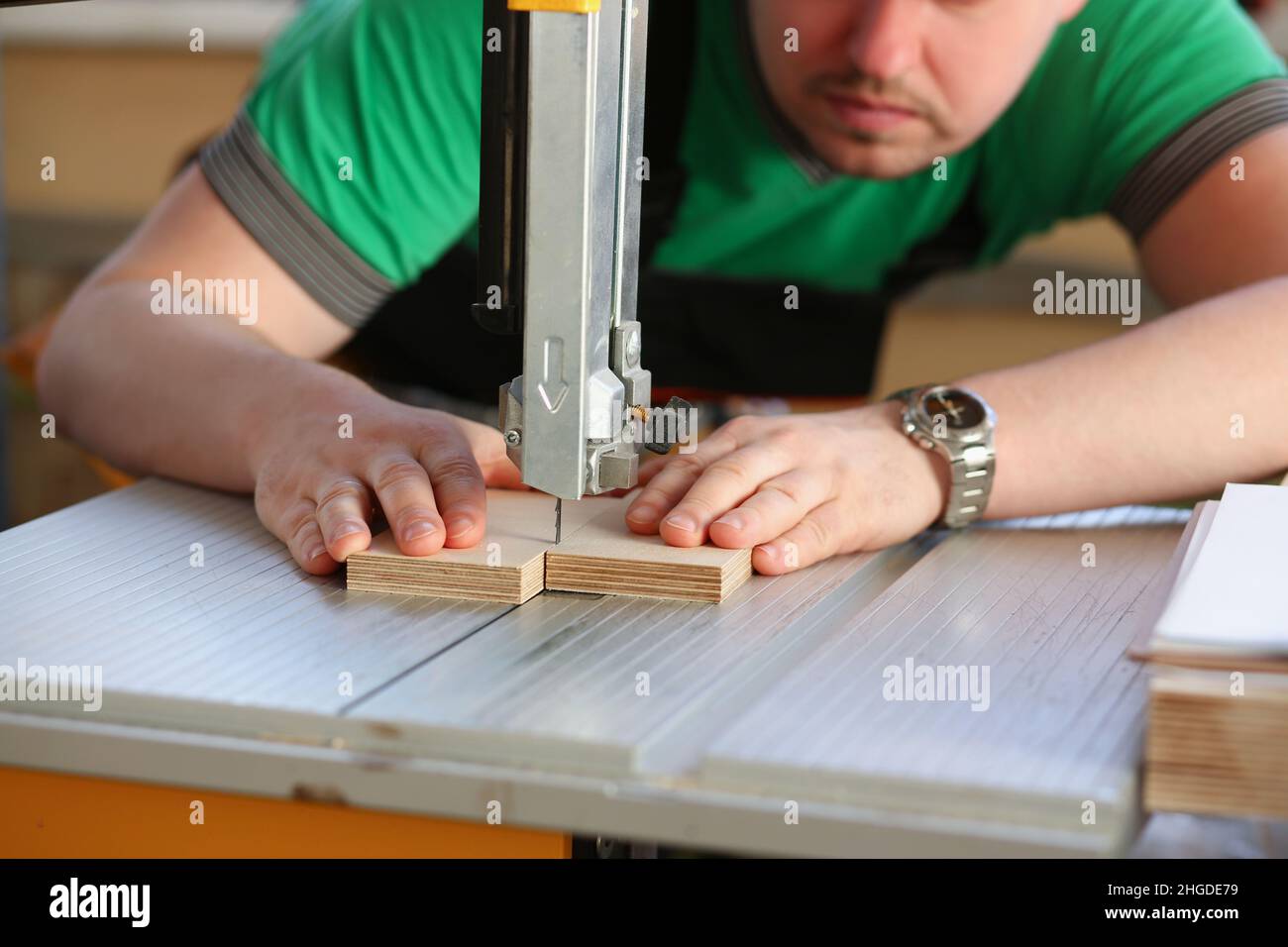 Worker using electric saw, handyman on workplace, diy Stock Photo - Alamy