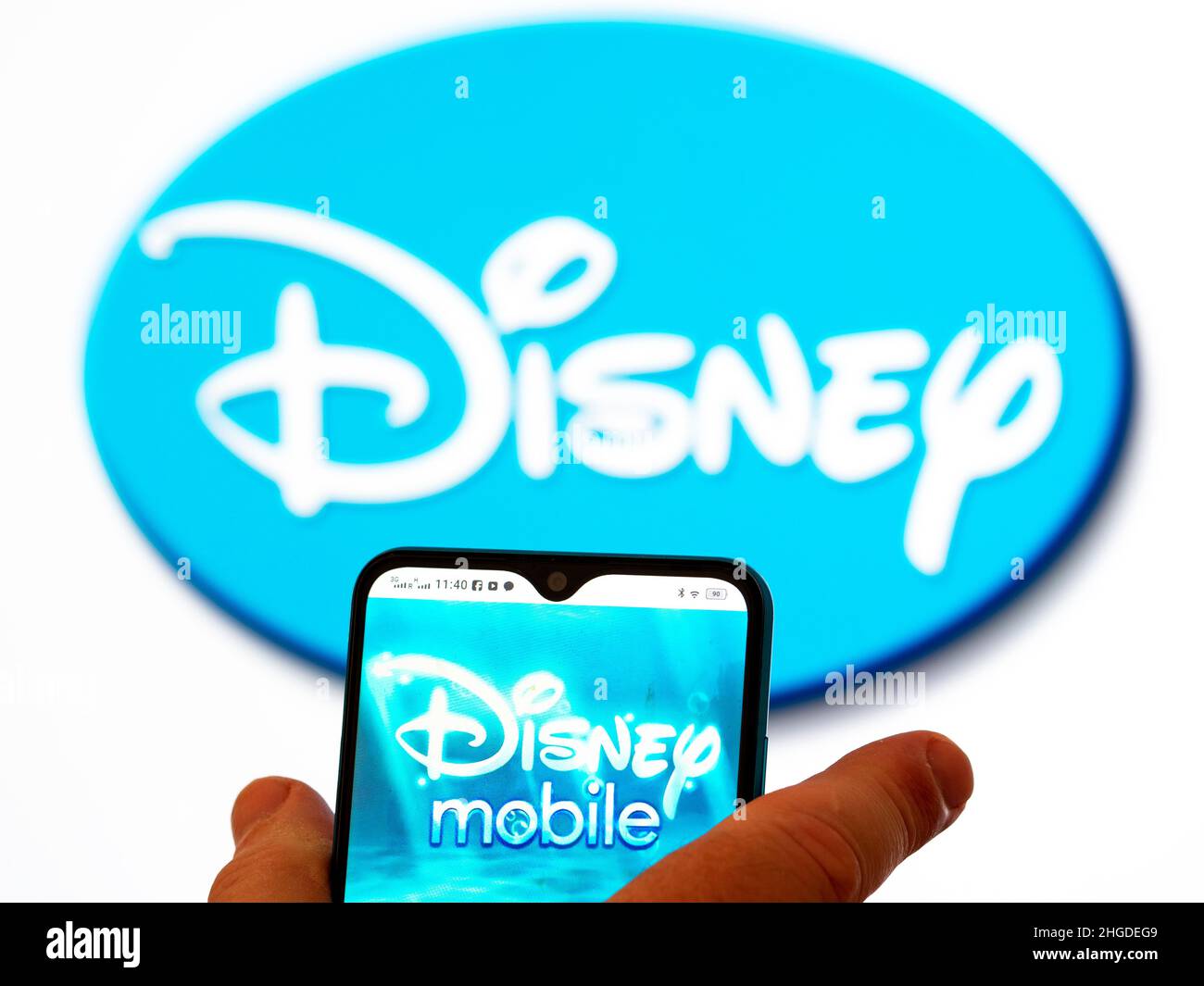 In this photo illustration, the Disney Mobile logo is seen displayed on ...