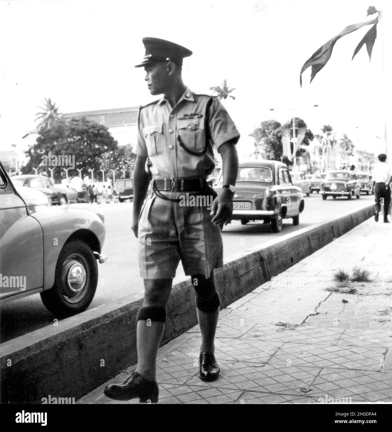 Singapore policeman 1967 patrolling on the waterfront shortly after ...