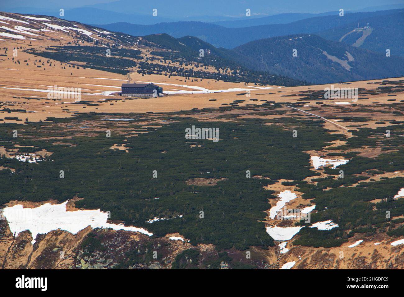View of Lucni bouda from the summit of Snezka,the highest mountain of ...