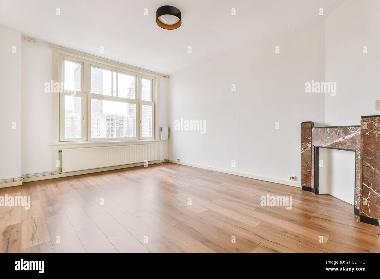 Interior of a bright room with large windows Stock Photo - Alamy