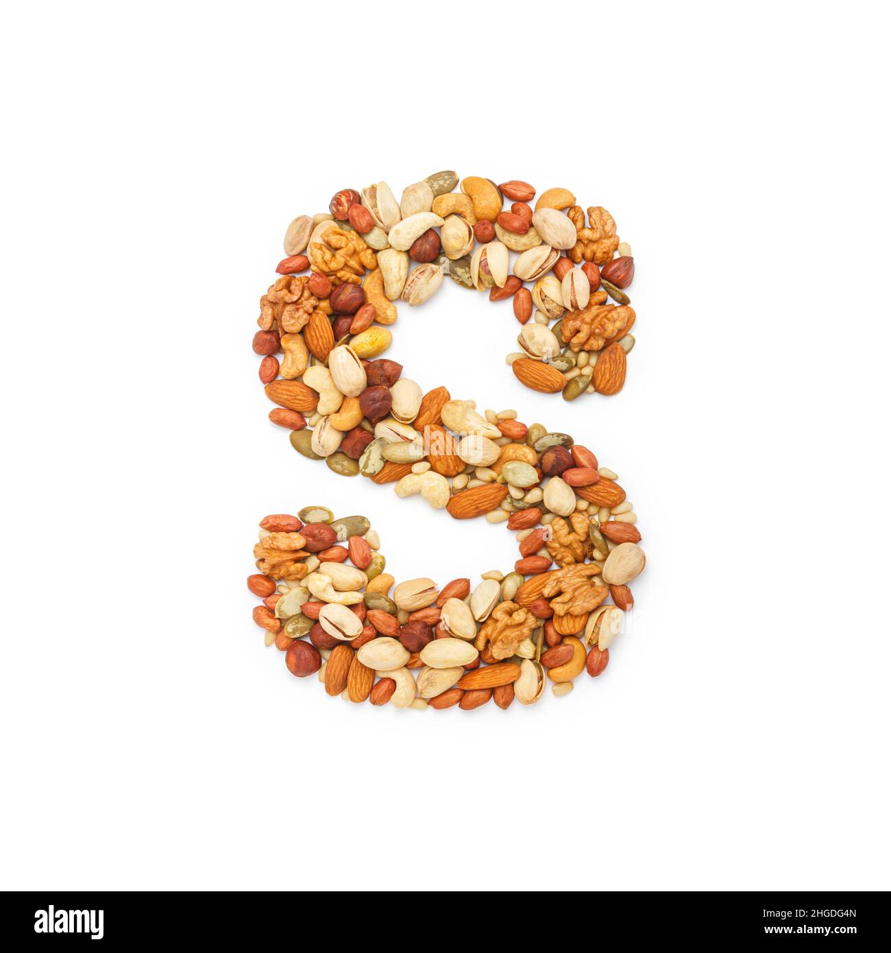 Letter S which is laid out from different nuts, isolated on white ...