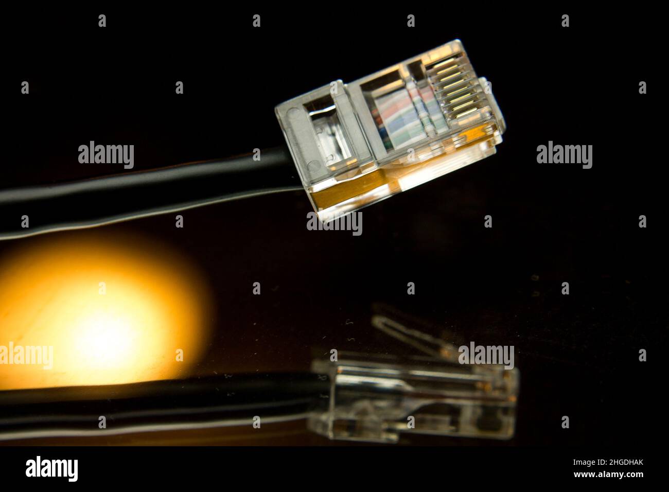 Artistic shot of an ethernet cable and its reflection Stock Photo - Alamy
