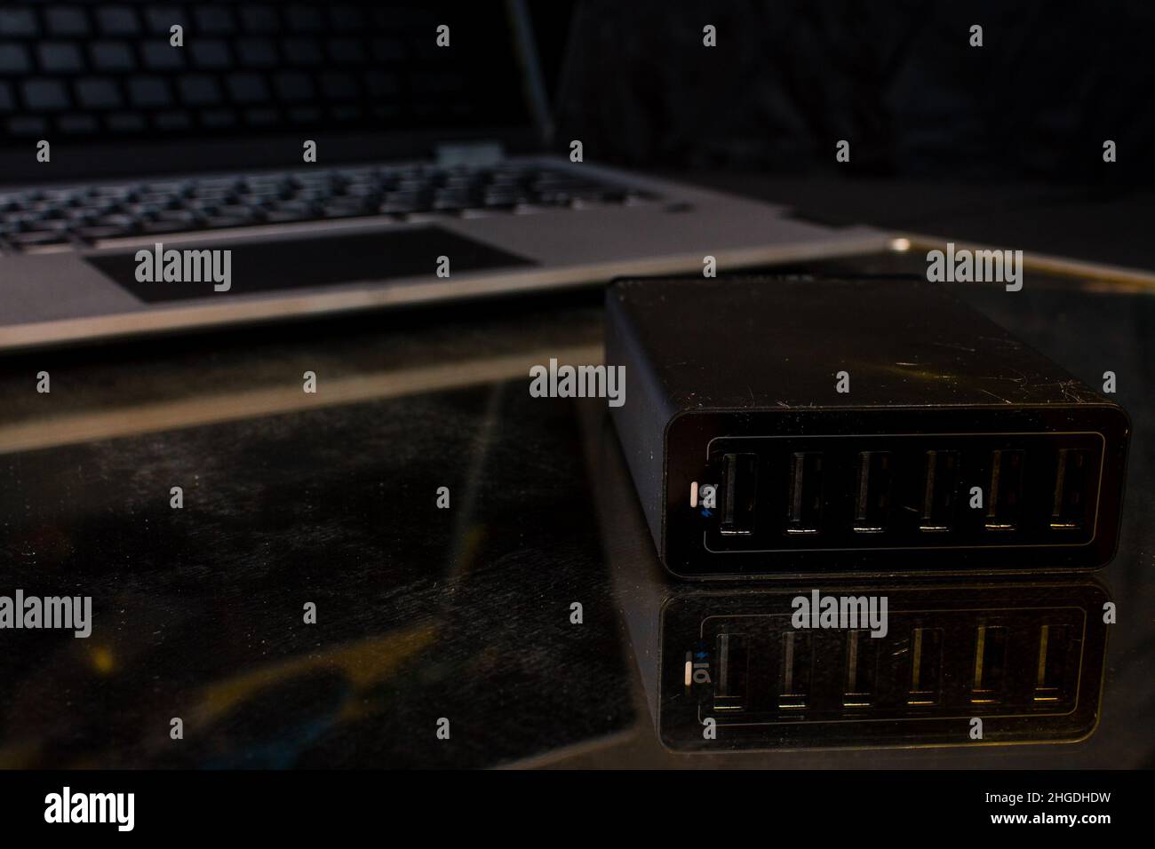 Office workspace showing a computer and a usb bank Stock Photo - Alamy