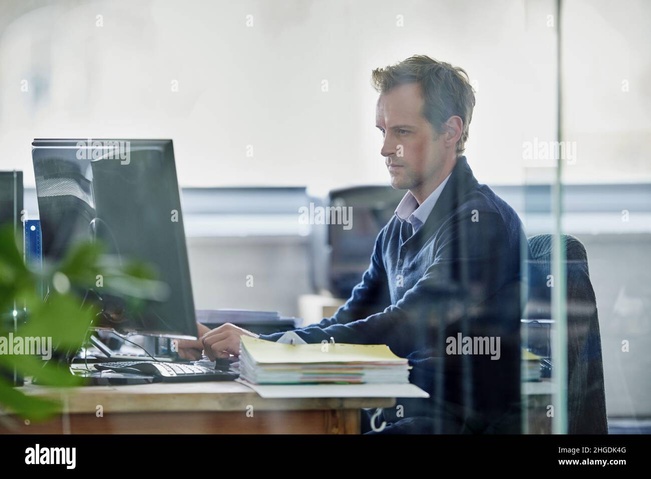 Getting work done handsome hi-res stock photography and images - Alamy