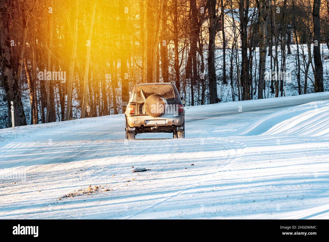 Car driving slowly street hi-res stock photography and images - Alamy
