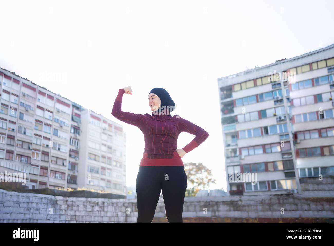 Young and happy Muslim woman expressing her inner strength Stock Photo ...