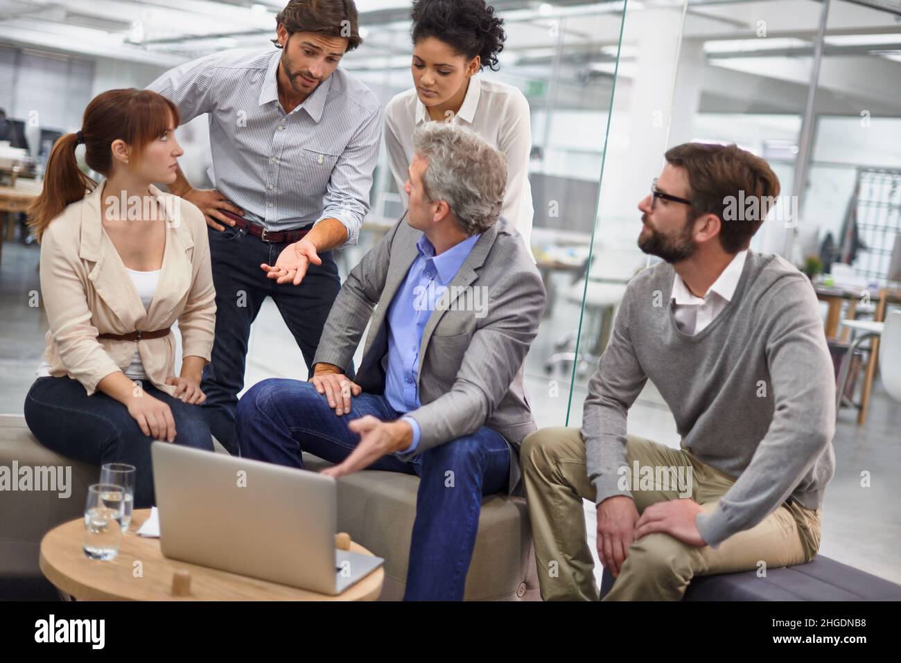 What a team. Portrait of a diverse group of office professionals Stock ...