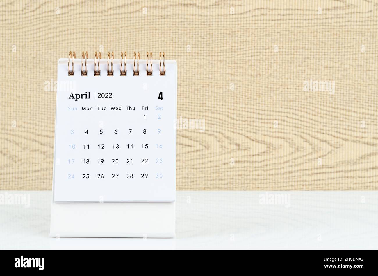 The April 2022 desk calendar on the table Stock Photo - Alamy