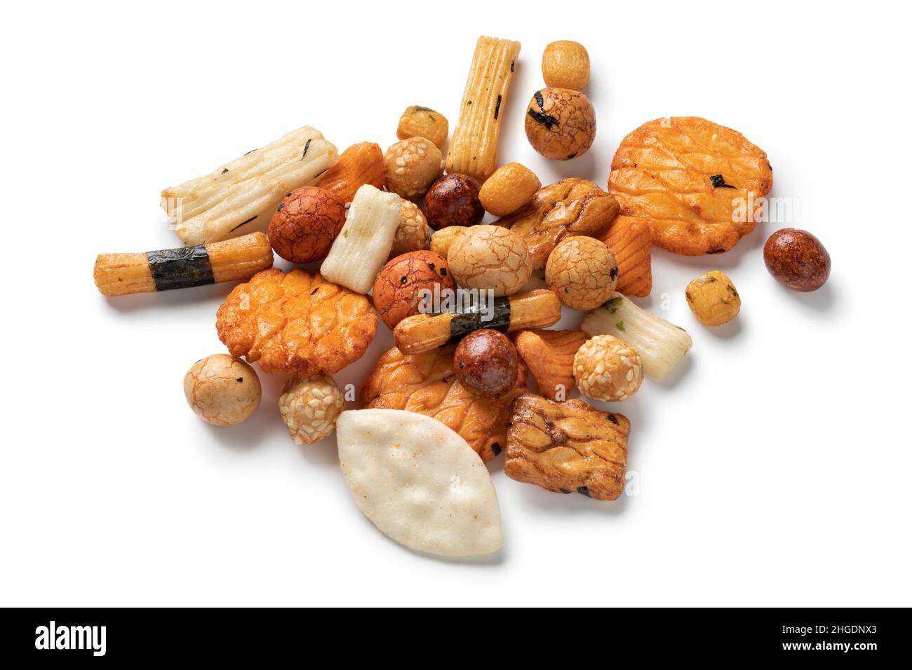 Heap of a mixture of Japanese rice crackers, senbei, close up isolated ...