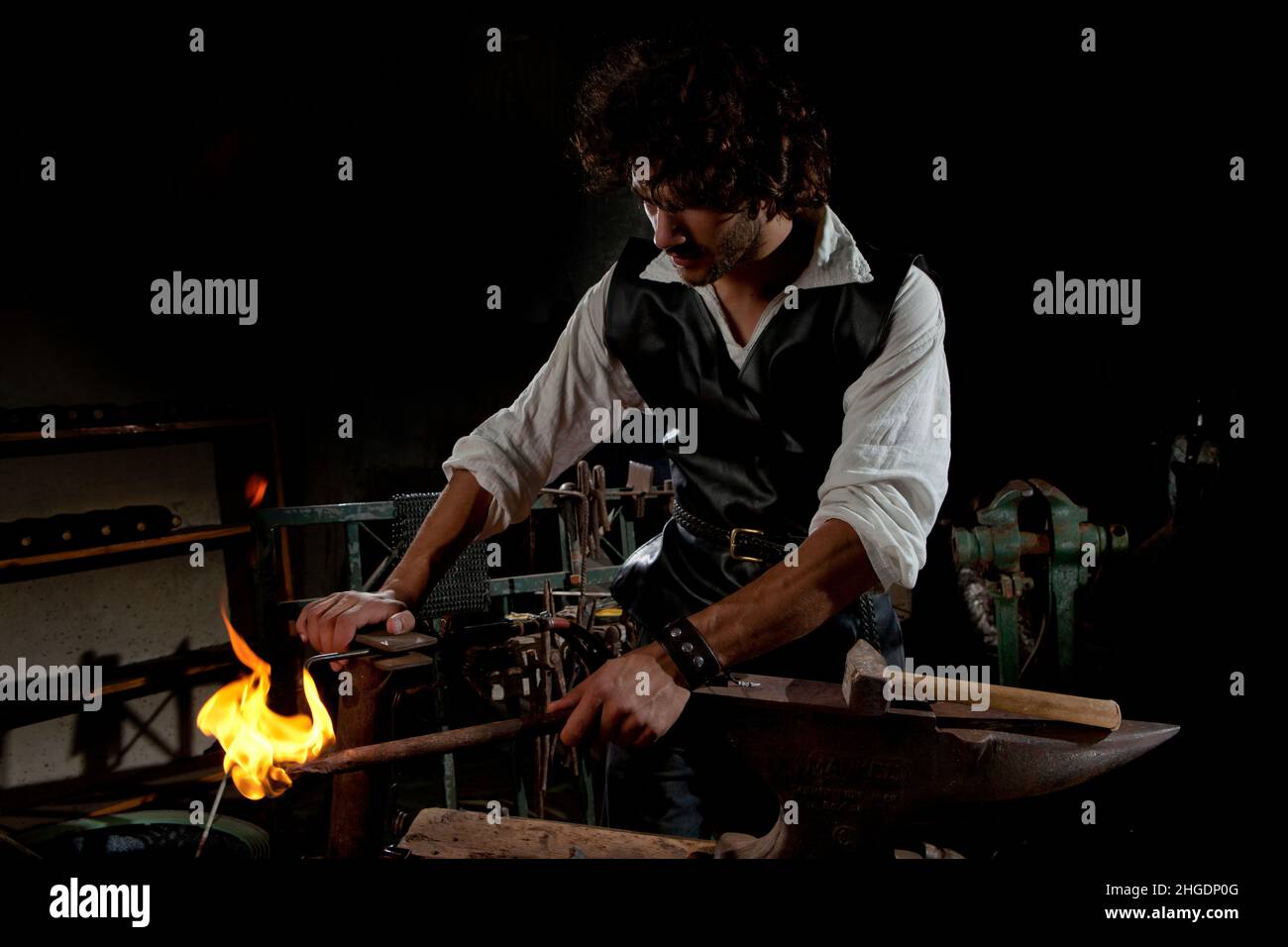 Old style manual labour Blacksmith Stock Photo - Alamy