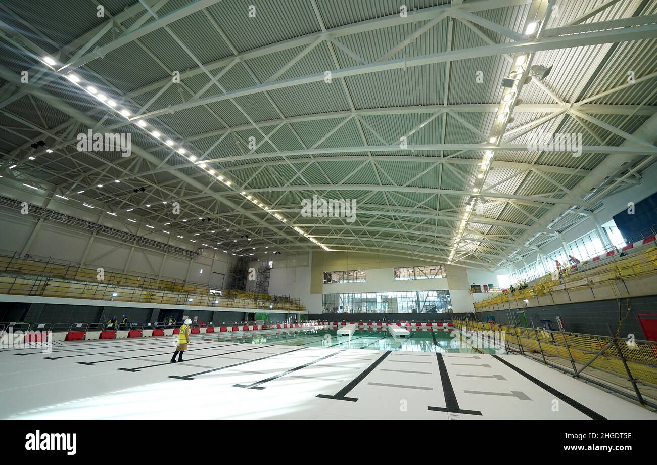 Culture Secretary Nadine Dorries looks over the newly filled pool ...