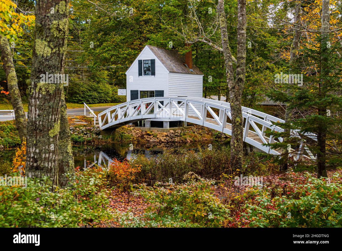 The arched white wooden foot bridge in Somesville, Mount Desert Island ...