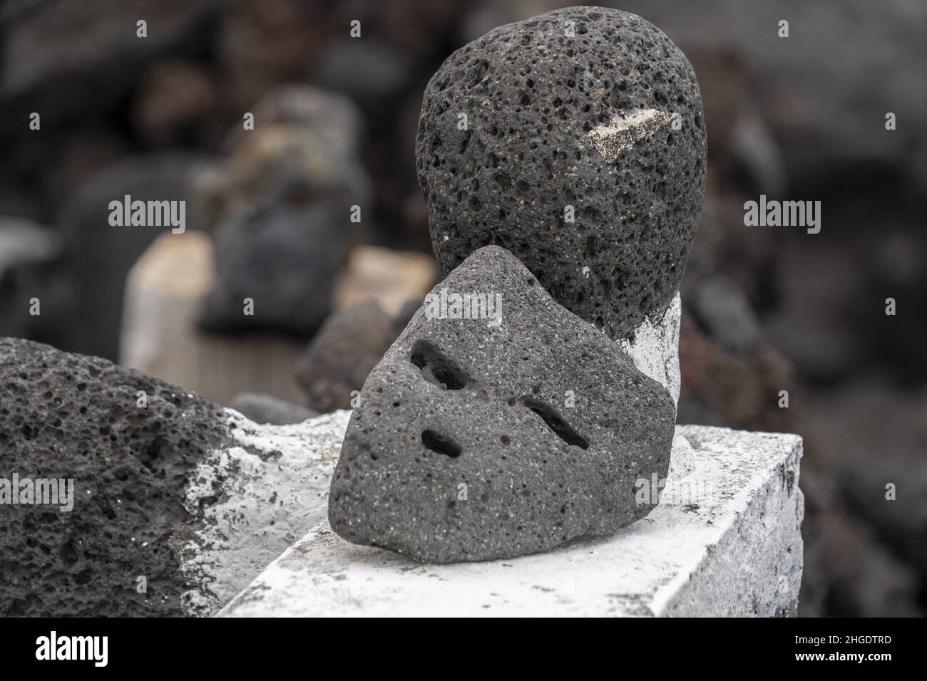 head and mask shape lava rock in Azores Stock Photo - Alamy