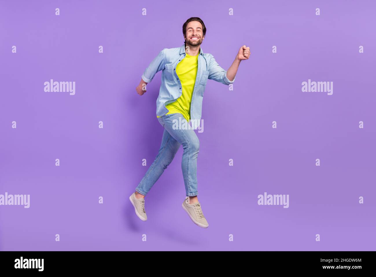 Full size photo of jumping smiling guy running fast speed traveling ...
