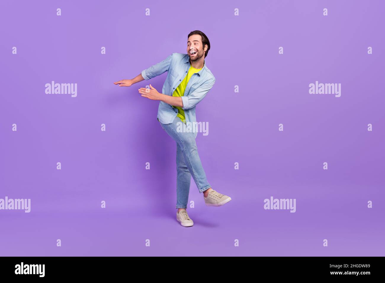 Full size photo of cheerful smiling guy dancing carefree enjoying free ...
