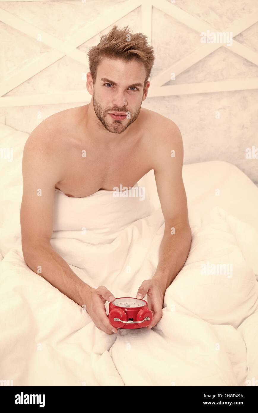 Man Waking Up Early Morning Ringing Alarm Clock Turn Off Clock Concept