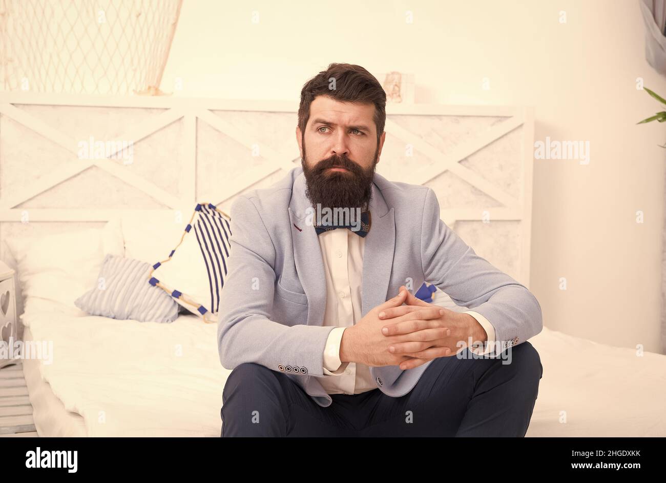 Man sit bed wait hi-res stock photography and images - Alamy