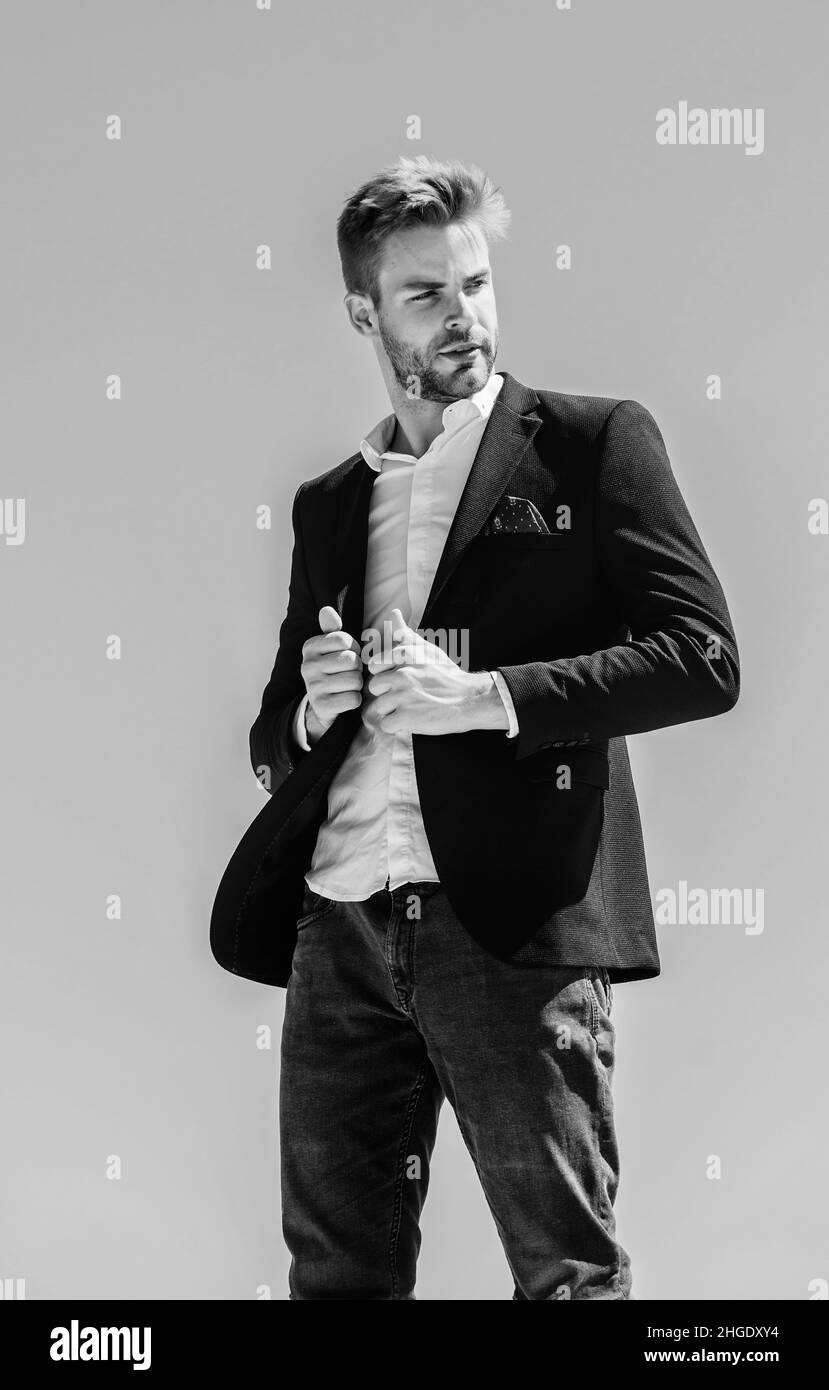 On top of world. Hipster with beard. Businessman against blue sky ...