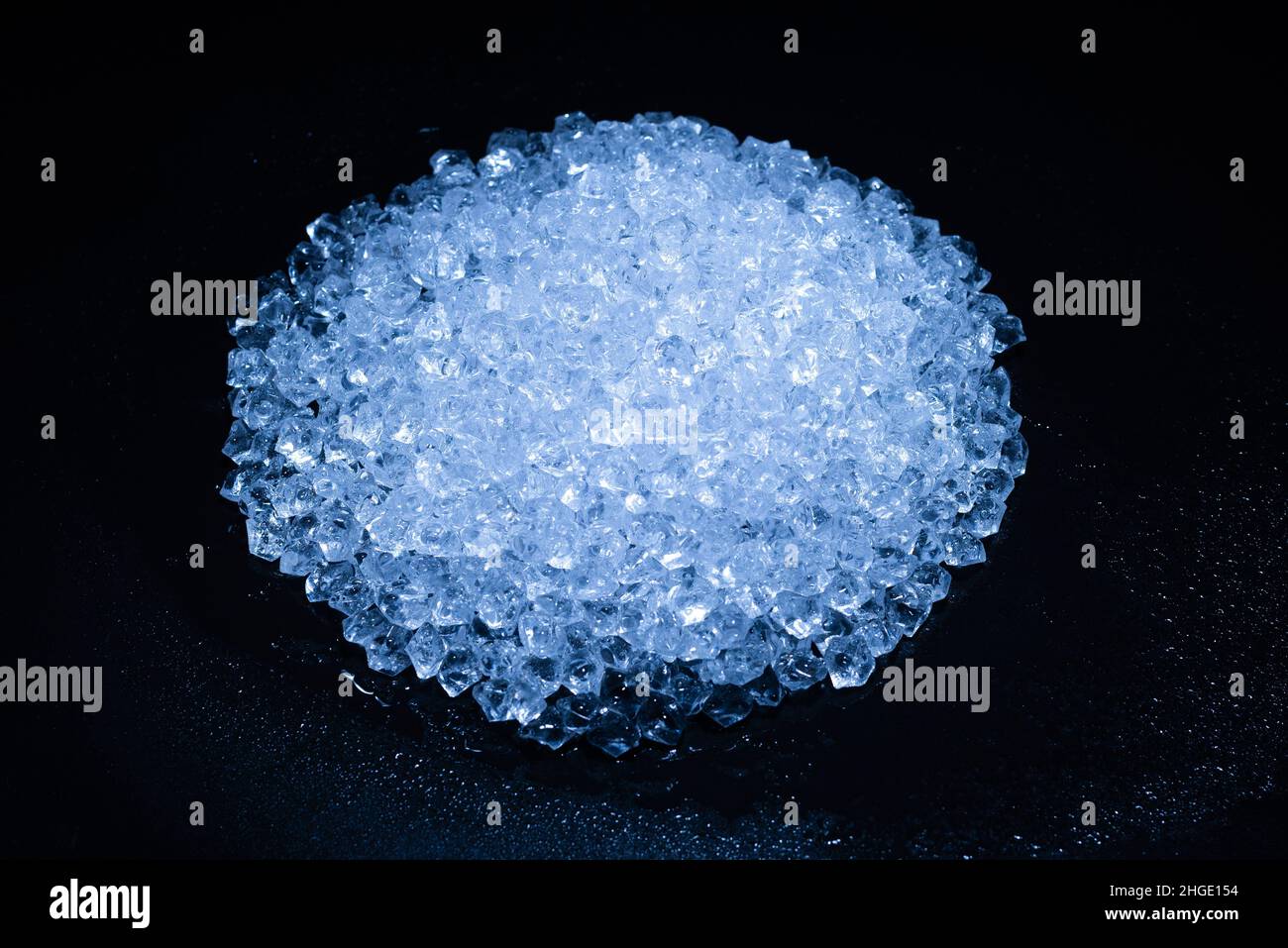 Ice crystal cubes on a black background, space for text or design Stock ...