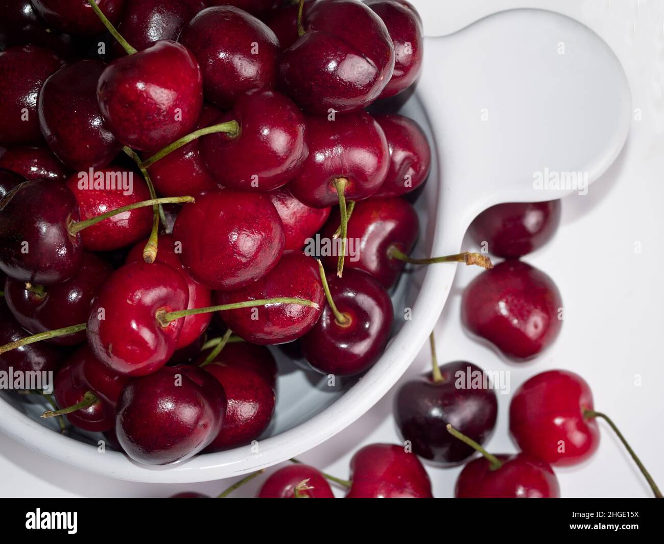A cherry is the fruit of many plants of the genus Prunus, and is a ...