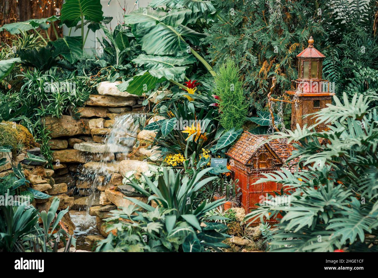Lighthouse and waterfall in holiday display Stock Photo - Alamy