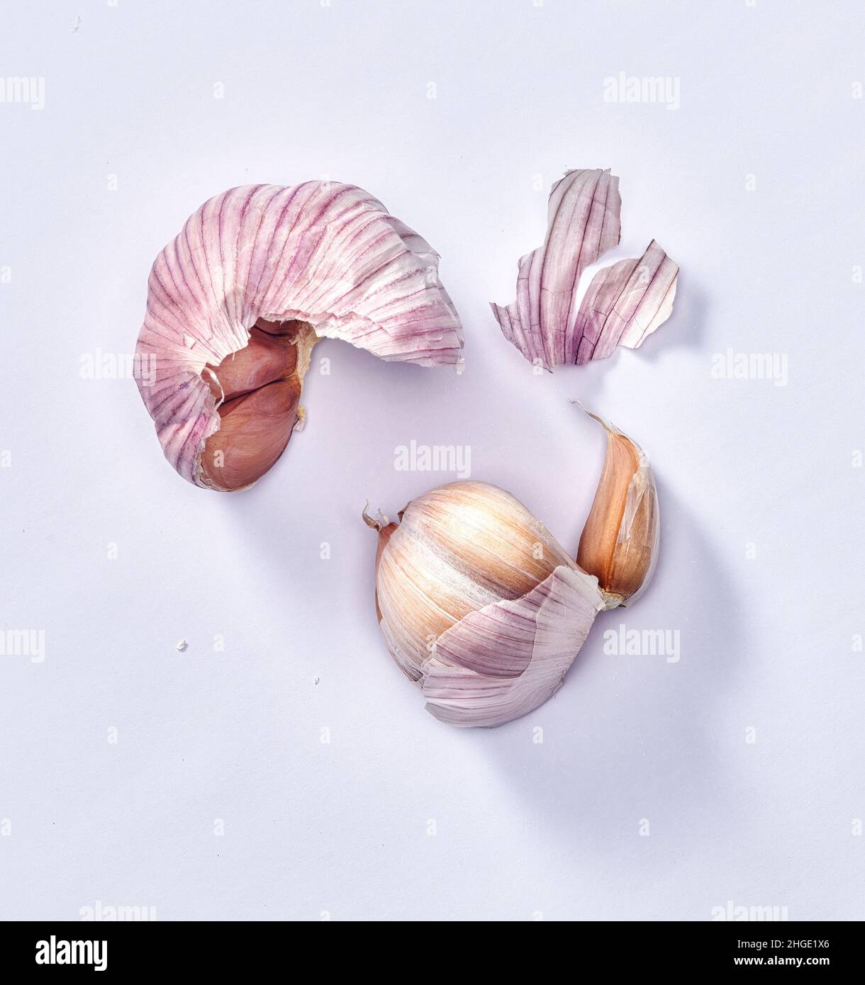 fresh garlic isolated on white, studio shot Stock Photo - Alamy