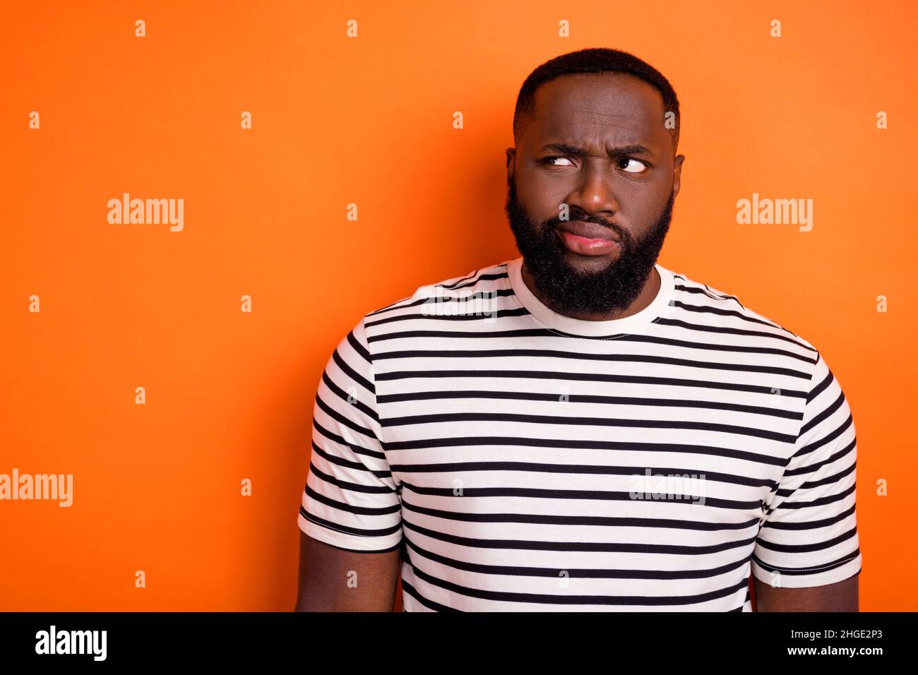 Photo of young african man moody displeased discontent look empty space ...