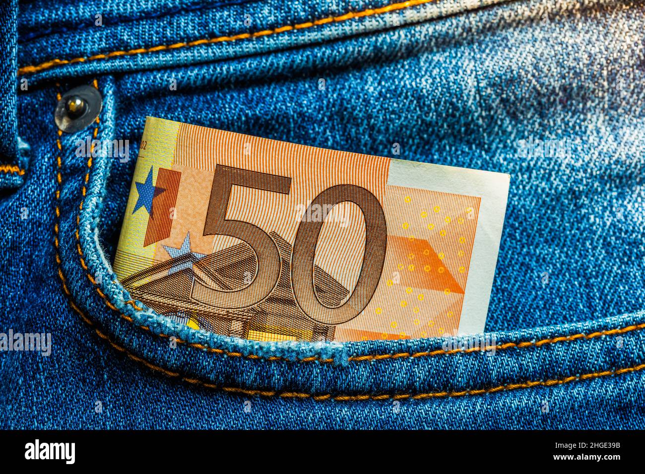 50 euro banknote in jeans pocket Stock Photo - Alamy