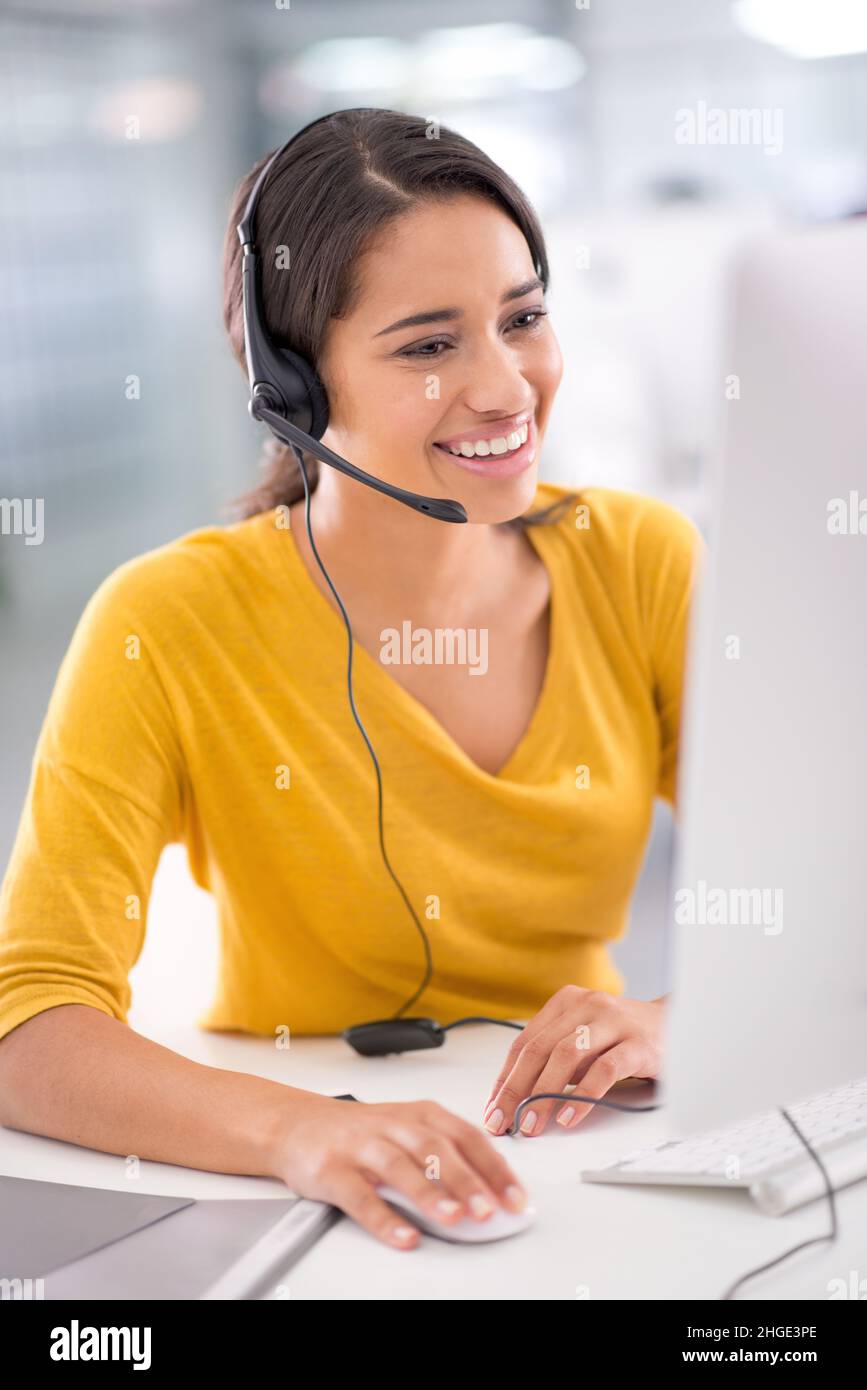 Every client is important to her. Shot of a young customer service ...