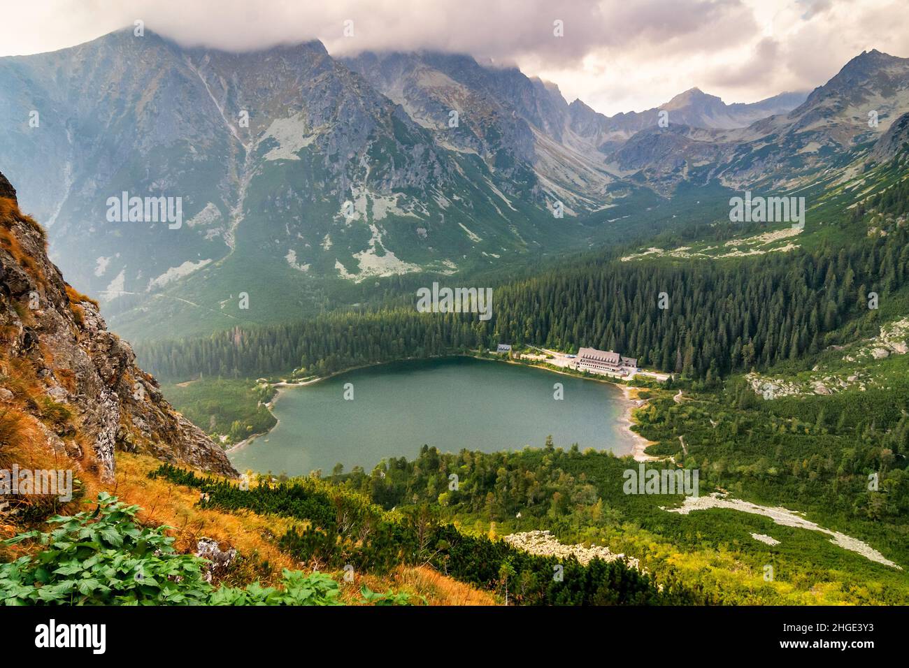 Mountainous landscape with glacial lake in the valley in the High ...
