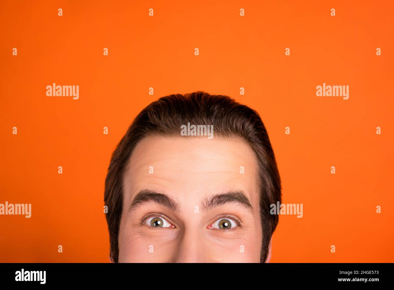 Cropped photo of astonished young man impressed advertising promo ...