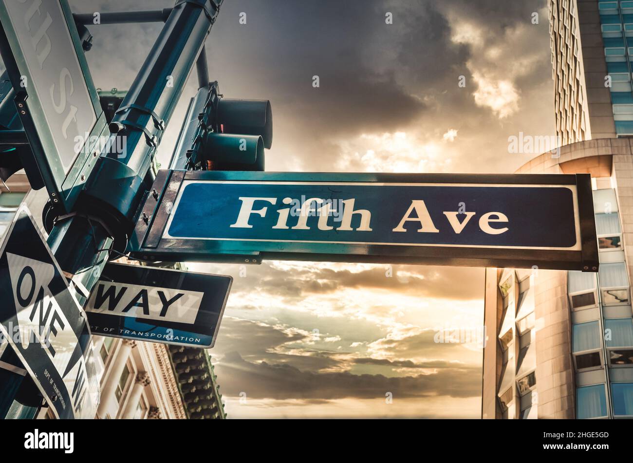 Fifth Ave 5th Ave, New York City sign, view from low angle with sunset ...