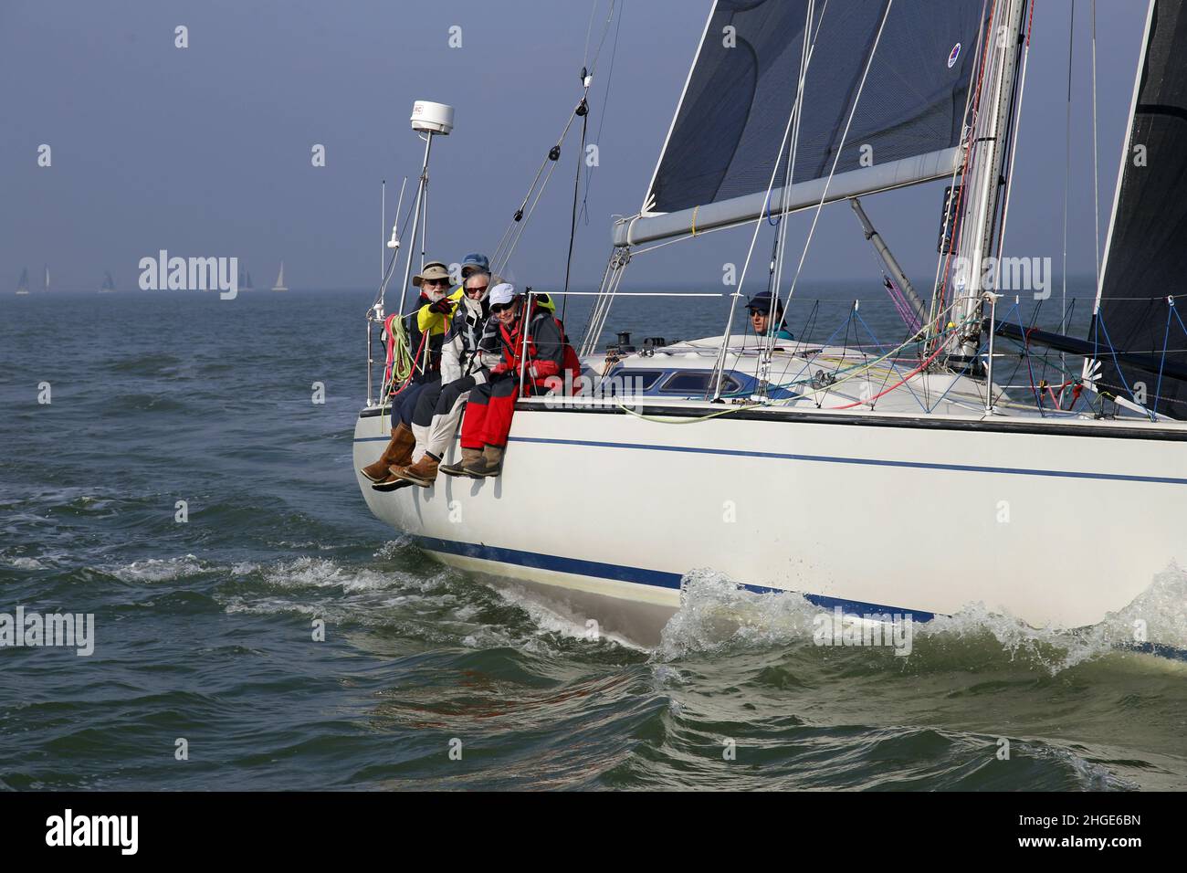 Riding the rail during a yacht race on The Solent Stock Photo - Alamy