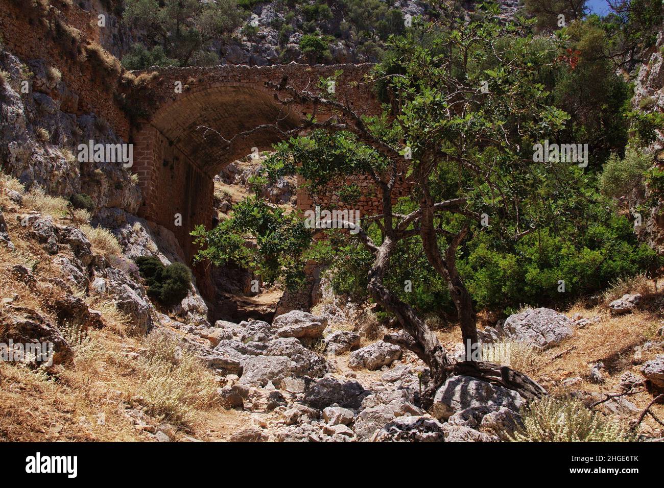 Old stone bridge at Monastery Katholiko on Akrotiri peninsula on Crete ...