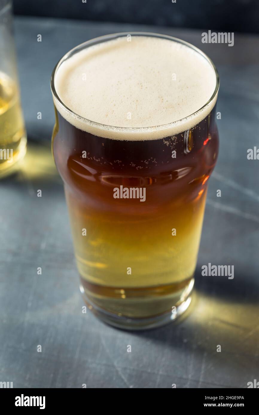 Cold Refreshing Snakebite Cider and Stout Cocktail in a Glass Stock ...